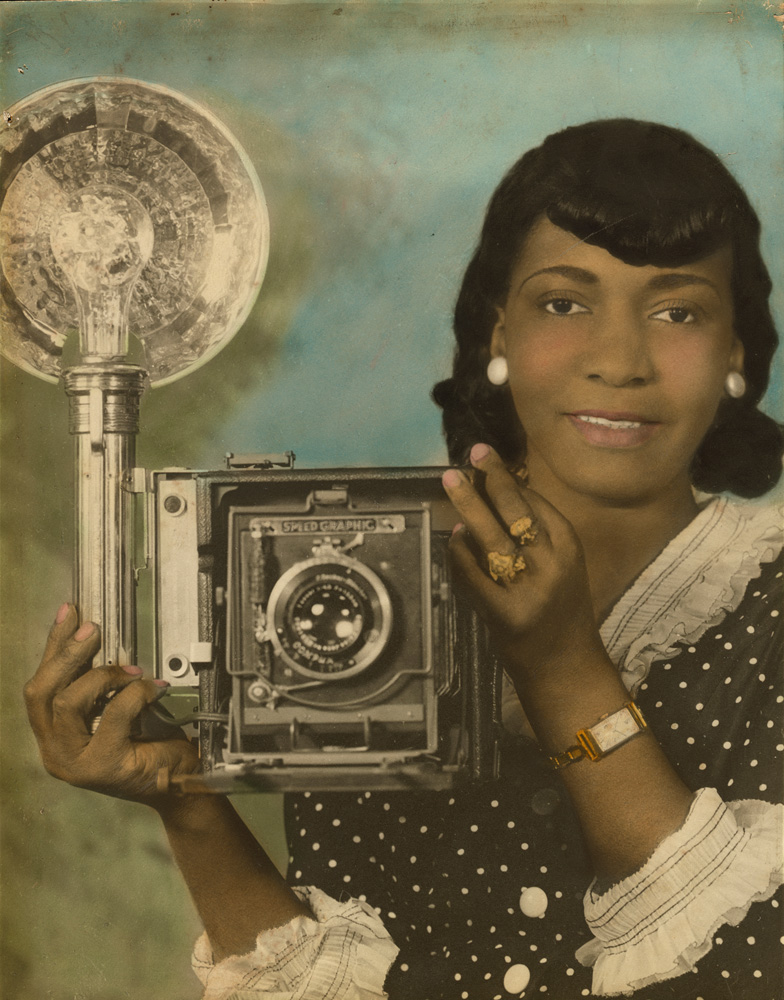 African American Photographer With Camera